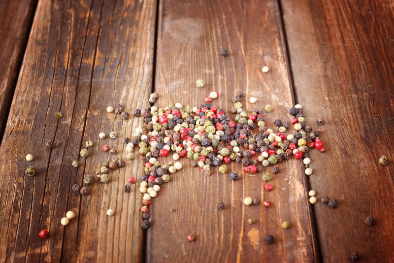Pepper spice on wood table stock image. Image of food - 36307593