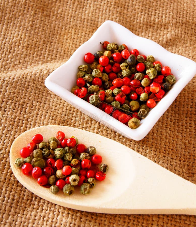 Pepper and wooden spoon . stock image. Image of fresh - 39520643