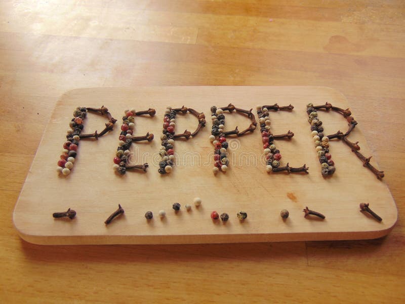 Pepper Written on Cutting Board with Pepper Stock Image - Image of cook ...