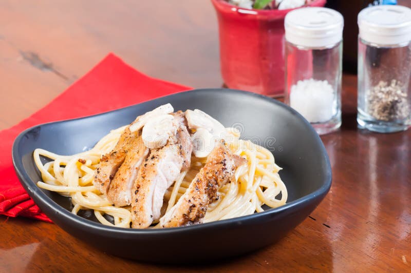 Peppered Chicken in Truffle Mushroom Cream Pasta Stock Photo - Image of ...