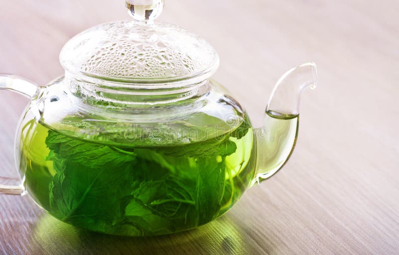 Peppermint tea on a table stock image. Image of full - 60886723
