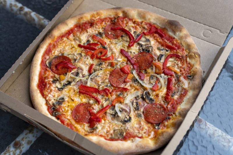 Pepperoni Pizza in a Box on a Rusty Table Stock Photo - Image of ...