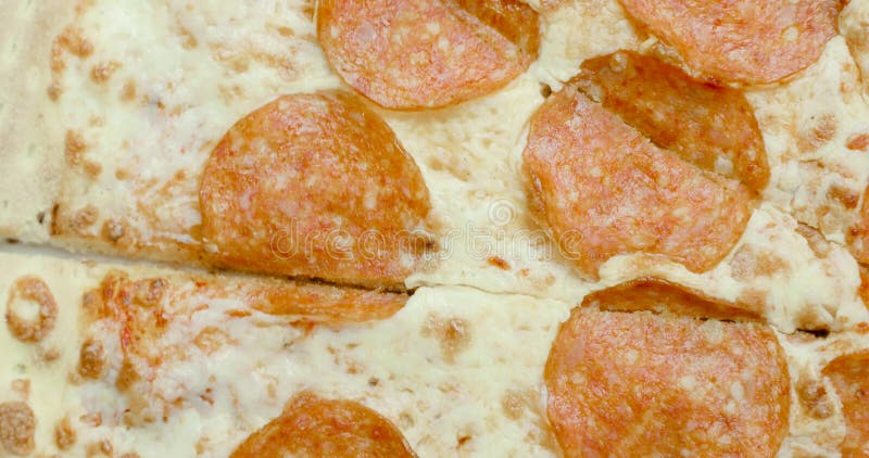 Pepperoni Pizza Revolves Around Its Axis Closeup Video 4k Stock Footage ...