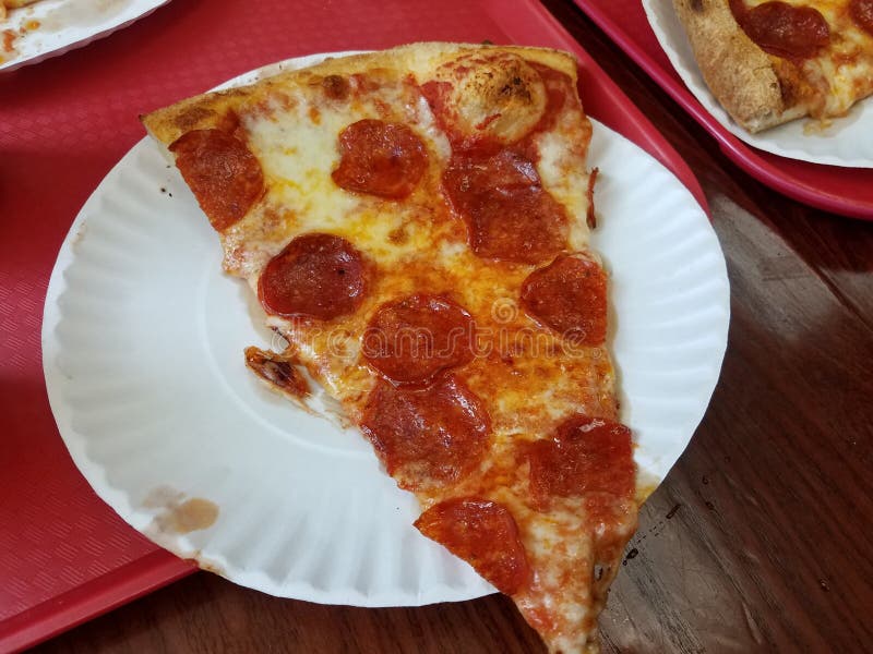Pepperoni Pizza Slice on Paper Plate and Red Tray Stock Image - Image ...