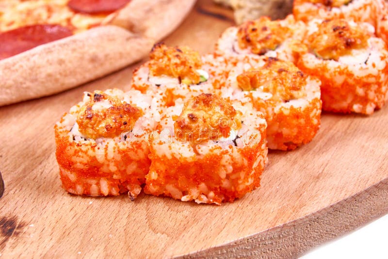 Pepperoni Pizza with Sushi Rolls Set on Wood Stock Photo - Image of ...