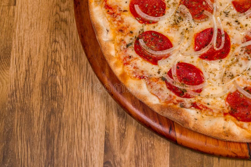 Pepperoni Pizza on Wooden Background. Brazilian Pizza Called Pizza De ...