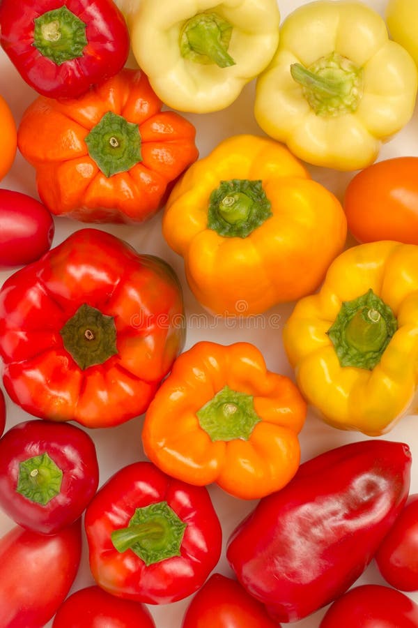 Peppers of Different Colors on a White Background. Top View Stock Image ...