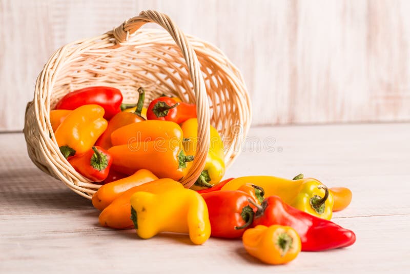Peppers Spilling Out of Basket Stock Image - Image of snack, fresh ...