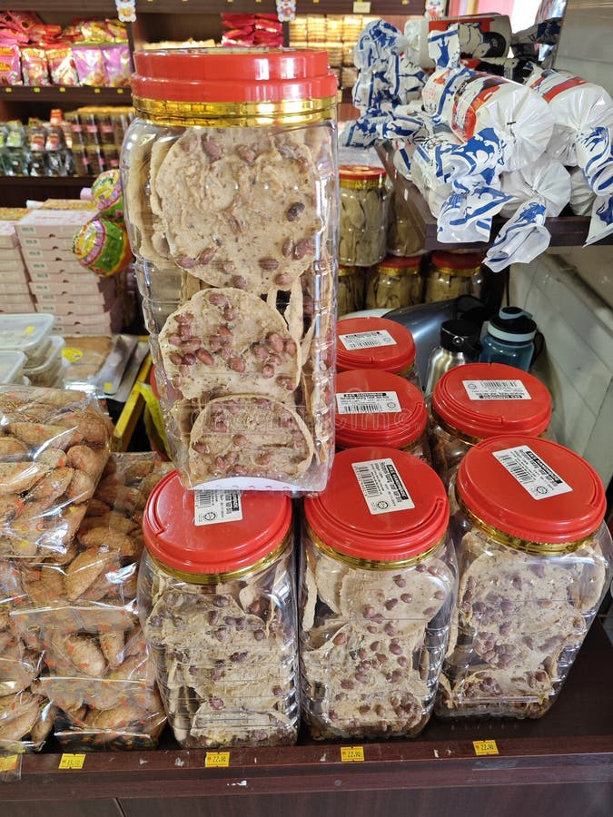 Crispy Deep Fried Round Peanut Biscuits Stored in Plastic Container is ...