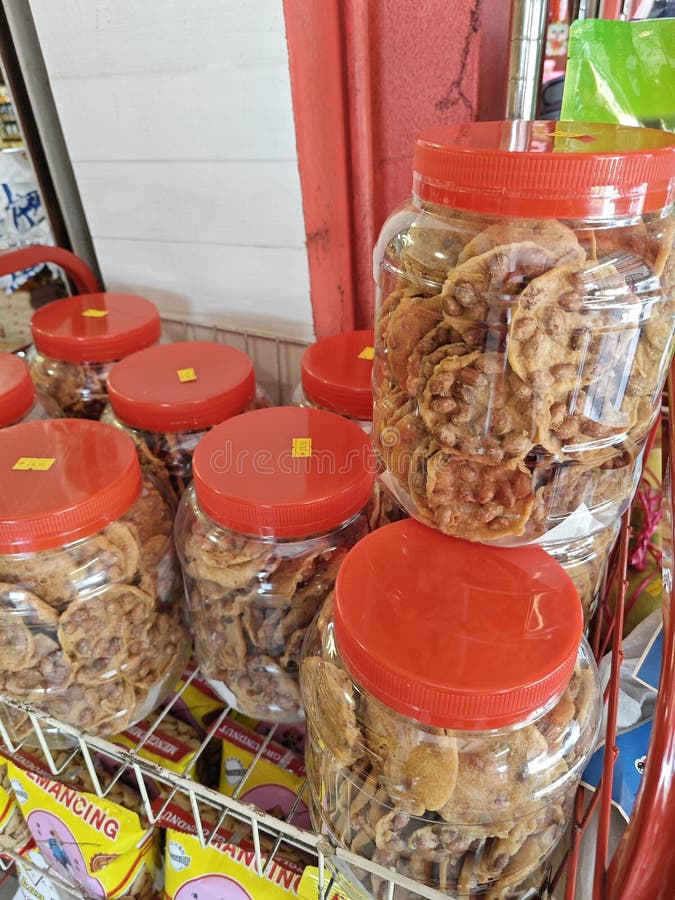 Crispy Deep Fried Round Peanut Biscuits Stored in Plastic Container is ...
