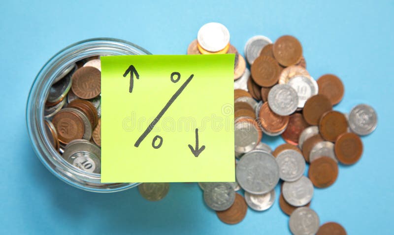 Percentage Symbol on Sticky Note with a Coins and Calculator Stock ...