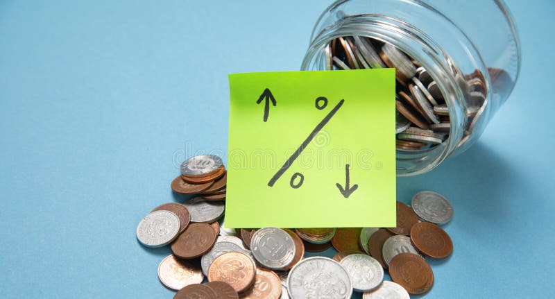 Percentage Symbol on Sticky Note with a Coins and Calculator Stock ...