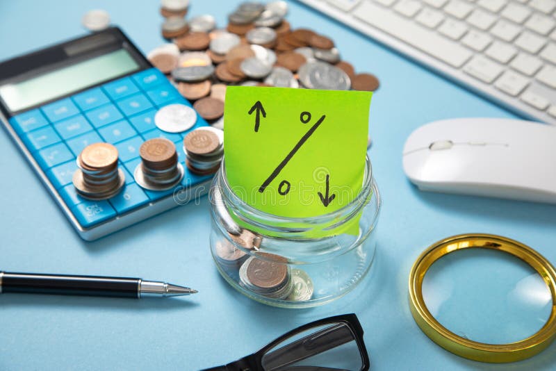 Percentage Symbol on Sticky Note with a Coins and Calculator Stock ...