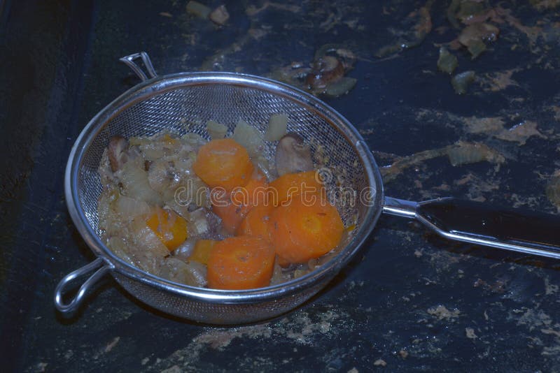 Percolation of Different Vegetables in the Metal Colander Stock Photo ...
