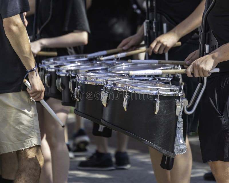 Several Percussionists of a Marching Band Drum Line Warming Up for a ...