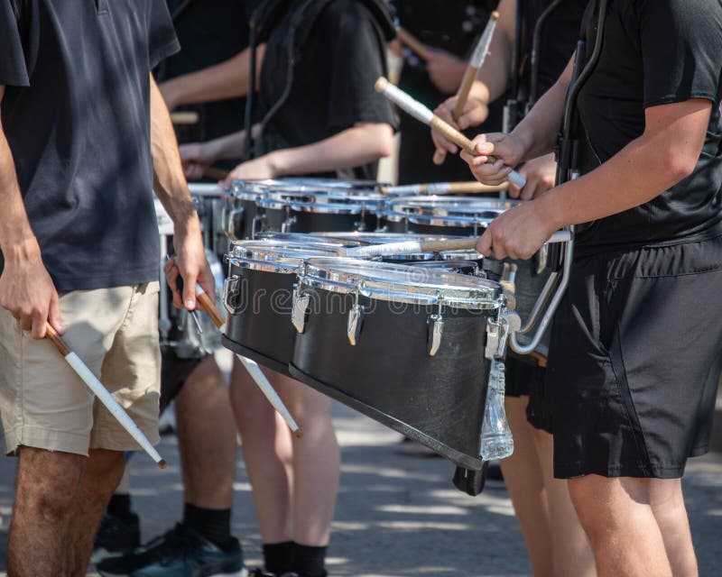 Several Percussionists of a Marching Band Drum Line Warming Up for a ...