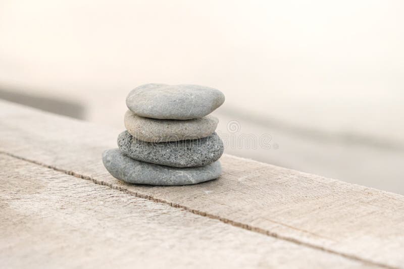Perfect Balance of Stack of Pebbles on the Seashore. Concept of Balance ...