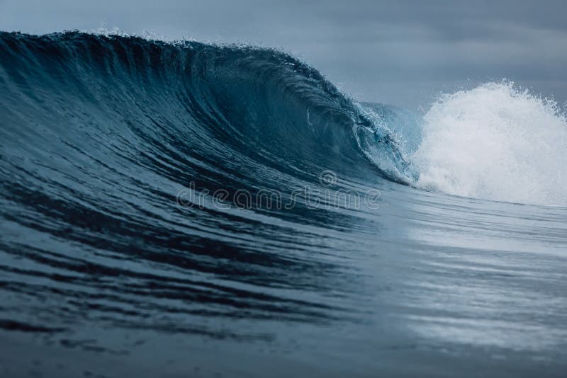 Perfect Barrel Wave on Beach. Breaking Ocean Wave with Cloudy Weather ...