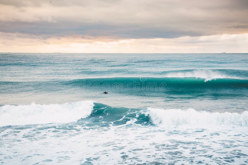 Perfect Big Breaking Ocean Barrel Wave and Alone Surfer Stock Image ...