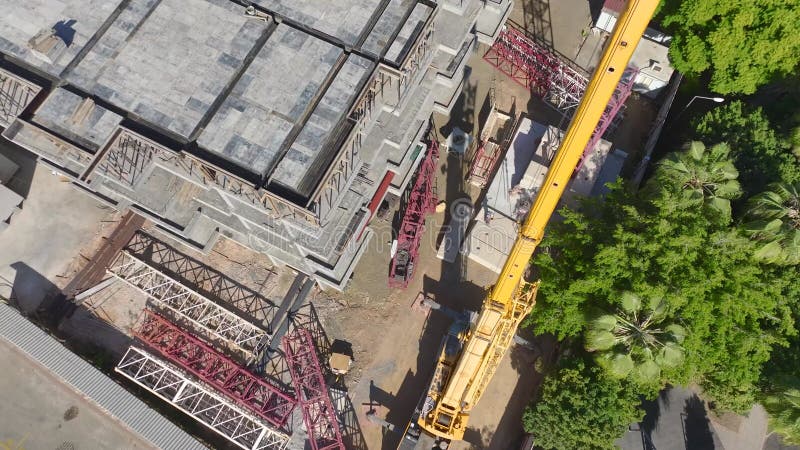 Aerial View: Crane Installation is Underway As Workers and Engineers ...