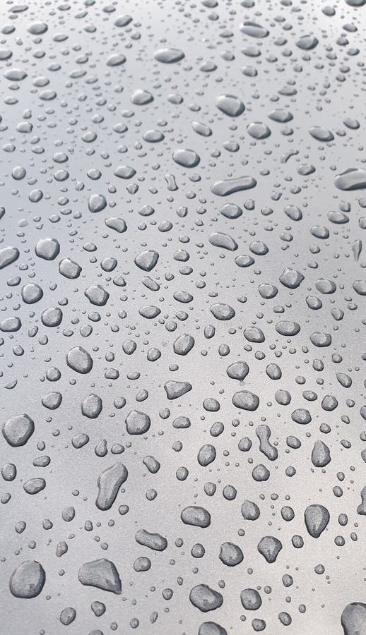 Perfect Droplets of Water on Grey Surface Stock Image - Image of drop ...