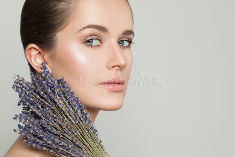 Perfect Model with Lavender Flowers and Clear Skin Stock Image - Image ...