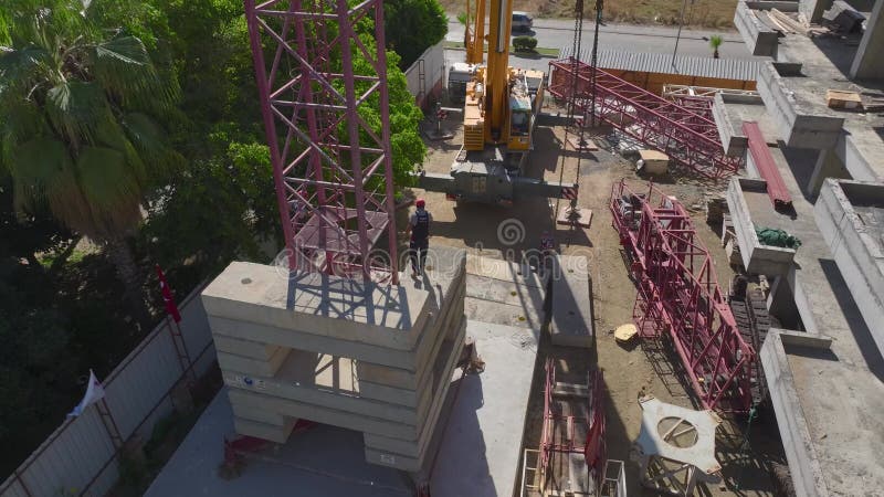 Aerial View: Crane Installation is in Progress with Workers and ...