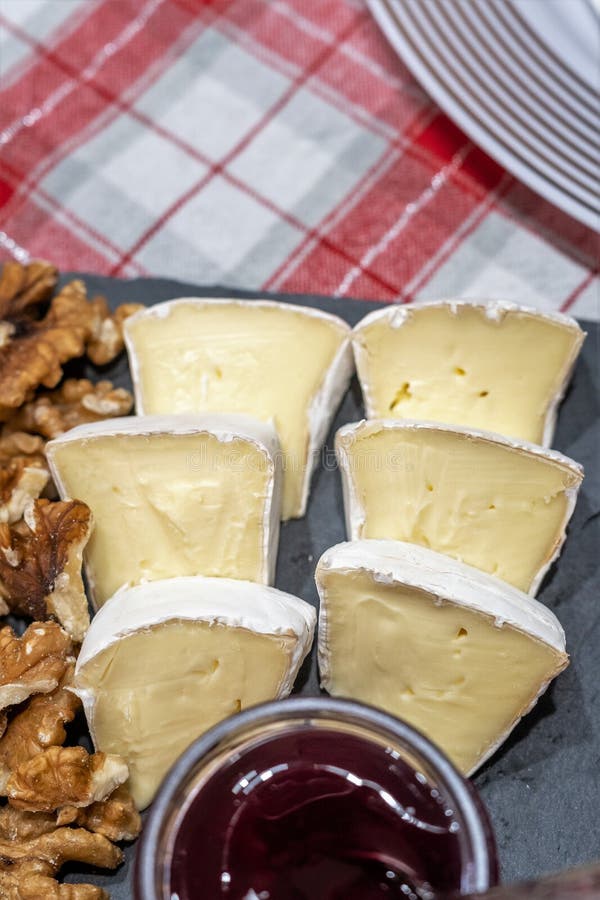 The Perfect Pairing: Brie Cheese and Jam Stock Image - Image of spread ...