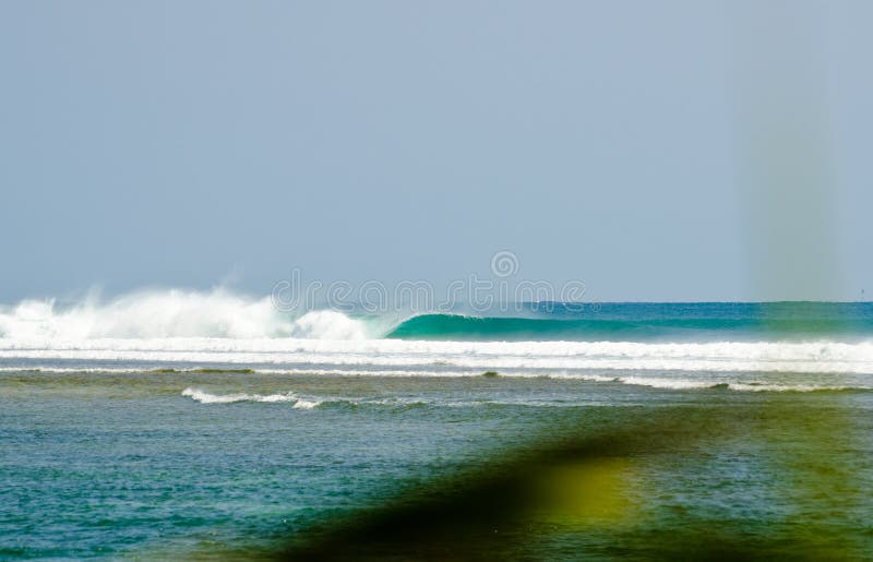 Perfect reef break stock photo. Image of boat, waves - 21971122