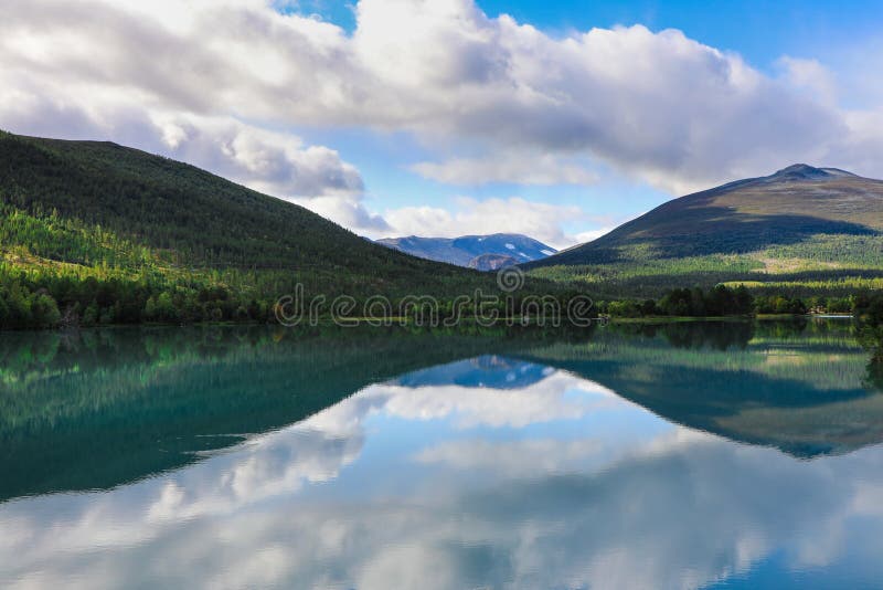 Reflection of Mountains on Still Alpine Lake Stock Photo - Image of ...