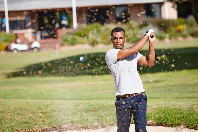 Perfect Shot. a Handsome Young Man Playing a Game of Golf. Stock Photo ...