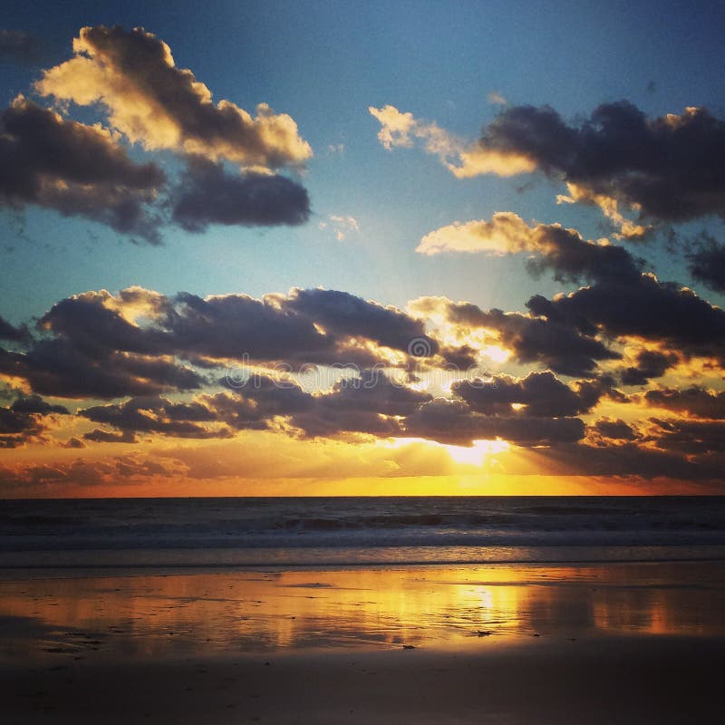 Perfect sunset at beach stock photo. Image of sunset - 46893516