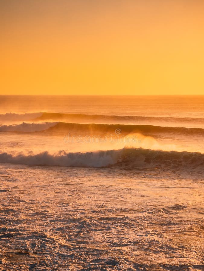 Perfect Waves at Sunset or Sunrise. Big Waves for Surfing in Bali Stock ...