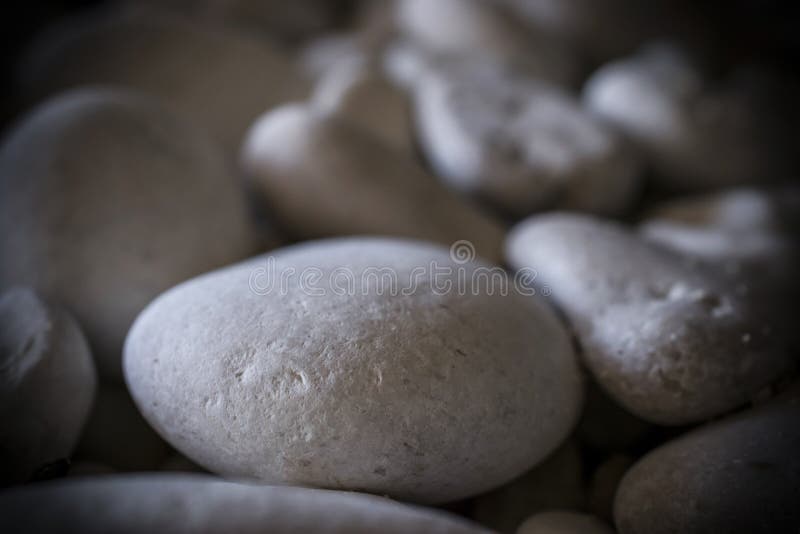 Perfect white pebbles stock photo. Image of myrthos - 257246720