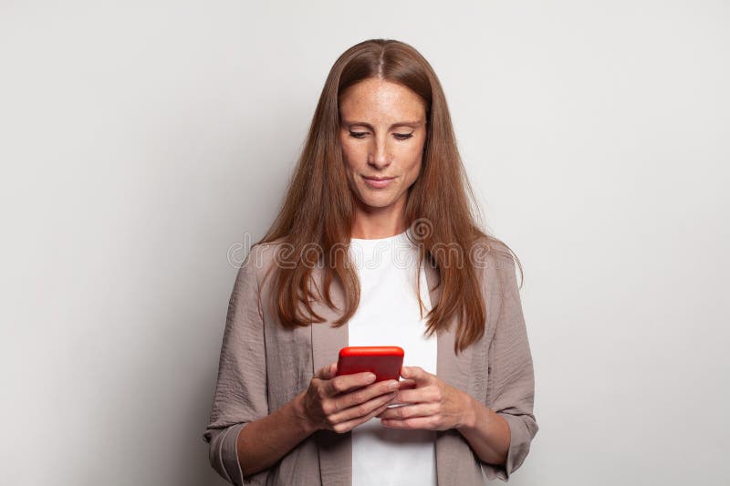 Perfect Woman Using Phone on White Background Stock Image - Image of ...