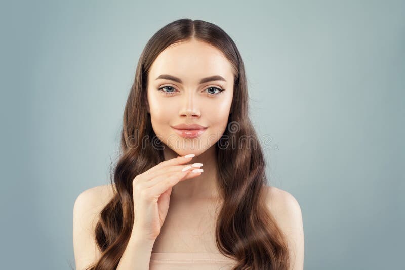 Perfect Young Smiling Woman With Long Brown Hair Smiling And Clear Skin