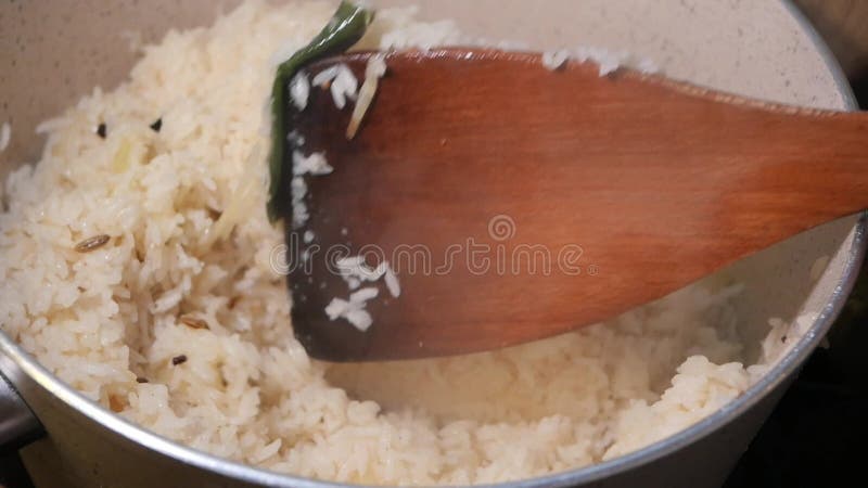 Perfectly Fluffy Rice Cooking Technique Shared at Home Kitchen Stock ...
