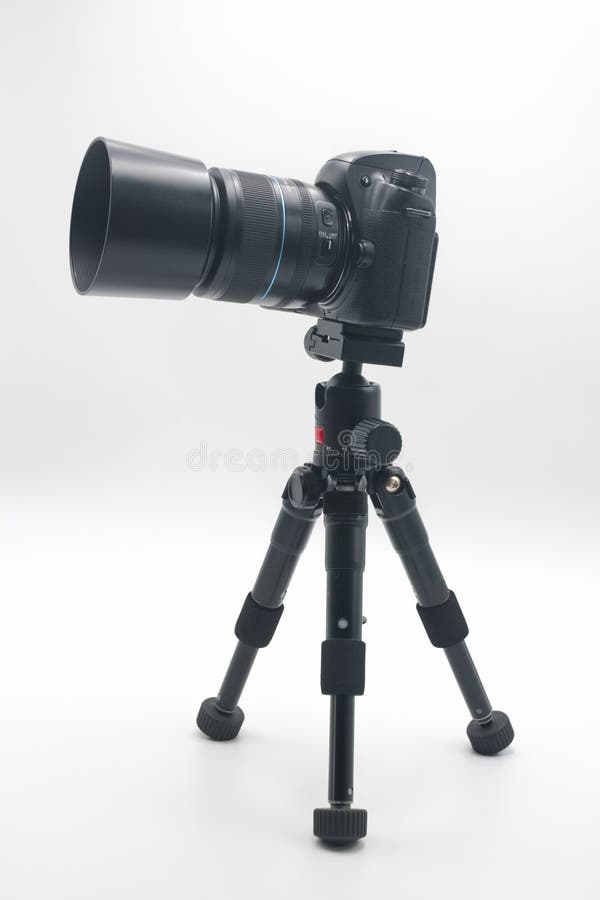 Perfectly Positioned Camera Set Up on a Sturdy Tripod Against a Clean ...