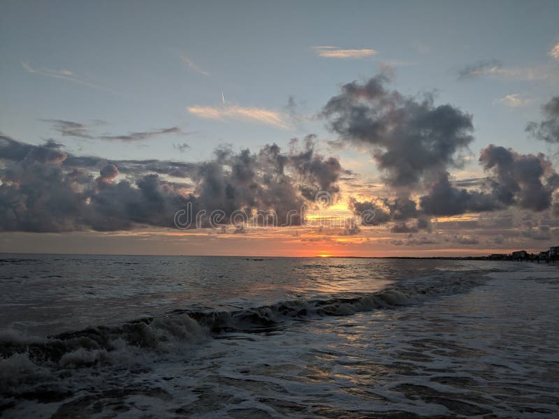 Perfectly Timed Beach Sunset Stock Photo - Image of sunset, perfectly ...