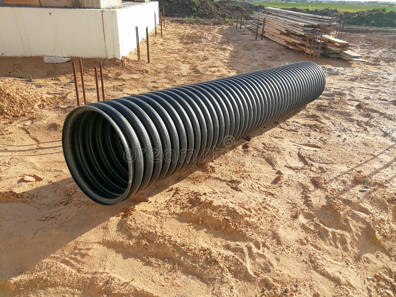 Black Corrugated Pipe for Water Canalization Stock Image - Image of ...