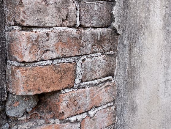 Perforated Brick Wall Texture with a Rustic and Weathered Look, Ideal for Backgrounds ...