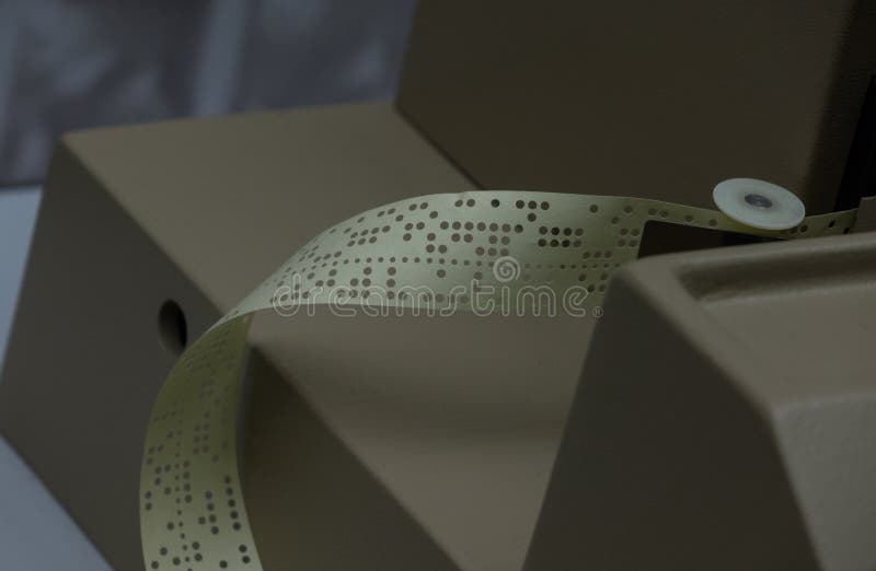 The Perforated Paper Tape of an Old Device Stock Image - Image of paper ...
