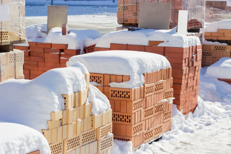 Perforated Red Bricks Covered Snow on an Outdoor Warehouse Stock Image ...