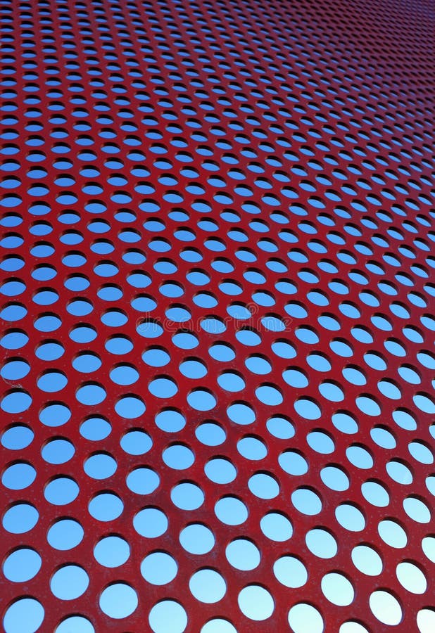 Perforated Red Panel stock image. Image of grid, closeup - 66731911