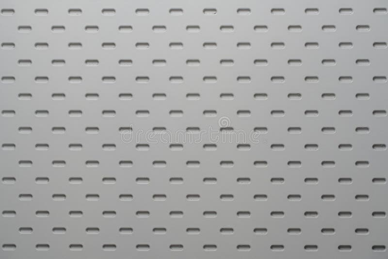 Perforated White Plastic Panel for Background or Texture. Surface with ...