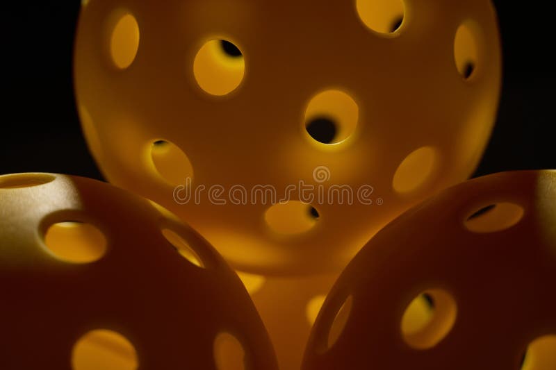 Perforated Yellow Plastic Balls for Pickleball Game Stock Photo - Image ...