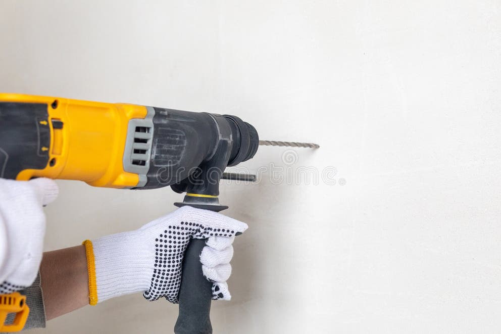 Perforating Machine is Drilling the Wall Stock Image - Image of ...