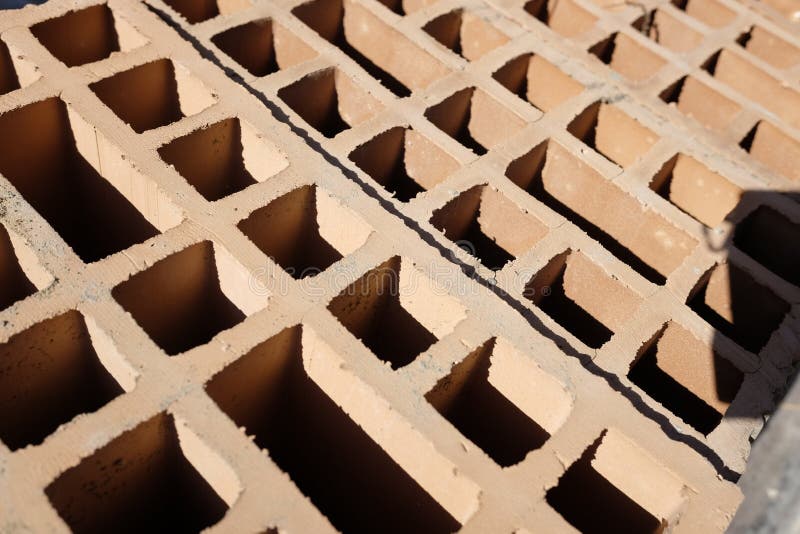 Perforierter Ziegelstein stockfoto. Bild von ziegelstein - 18548750