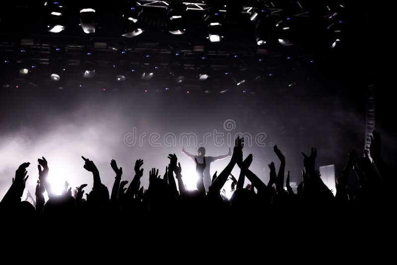 Performace of a Popular Group. Crowd is Dancing and Having Fun. Bright ...