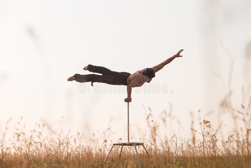 Performance of an Aerialist Outdoors during Sunset Stock Photo - Image ...